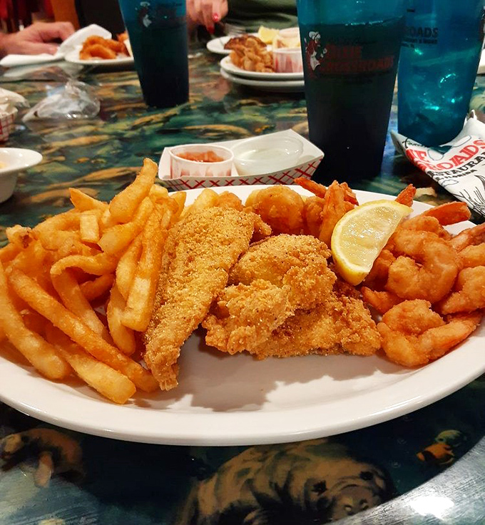 Golden-fried perfection meets French fry heaven. This platter doesn't just satisfy hunger &ndash; it creates lifelong cravings and fond memories.