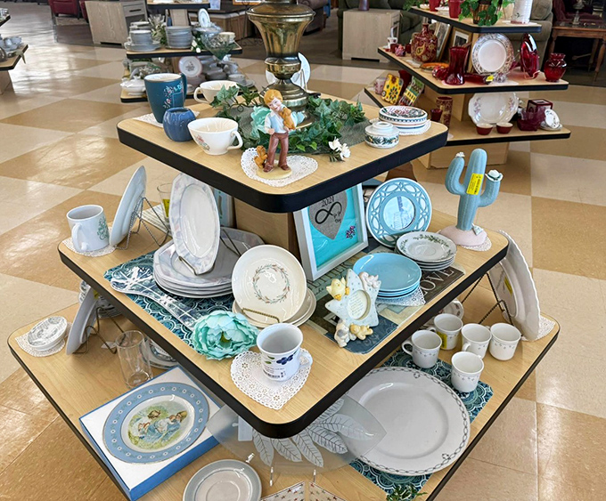A tiered display of dishes and decorative items creates a porcelain playground where your grandmother's china pattern is probably hiding.