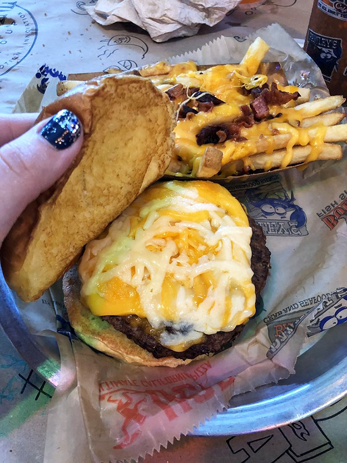 A proper burger should require both hands and at least three napkins. This cheese-draped beauty checks all the boxes of what happens when simple ingredients meet respect.