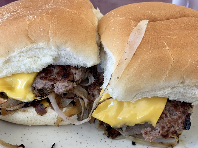 Behold the cross-section of burger perfection&mdash;where the melted American cheese meets caramelized onions and beef in a holy trinity of flavor.