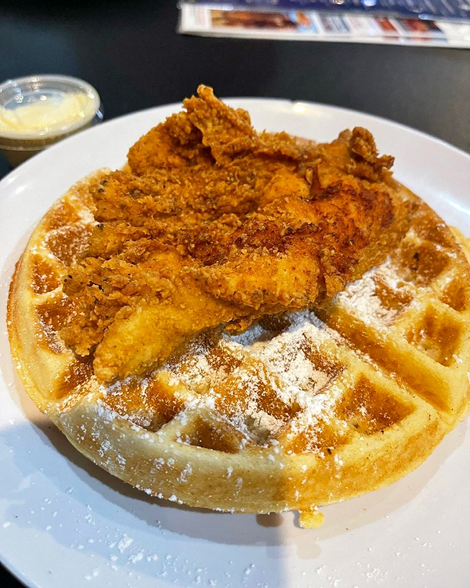 The star of the show: golden-fried chicken atop a fluffy waffle. It's the culinary equivalent of finding money in your old jacket pocket.