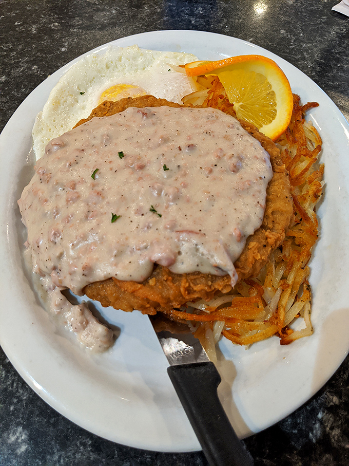 Chicken fried steak swimming in country gravy&mdash;a dish that laughs in the face of diets and wins the hearts of comfort food seekers everywhere.