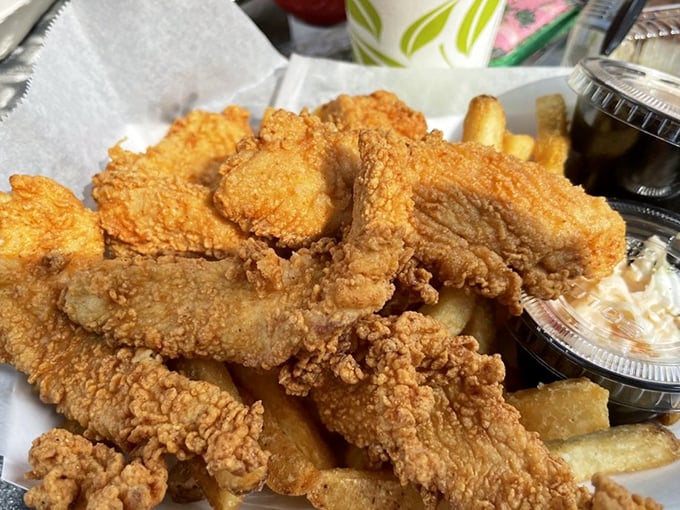 Golden-fried chicken tenders that would make your grandmother jealous. Crispy armor protecting juicy treasures within, they're comfort food elevated to art form.