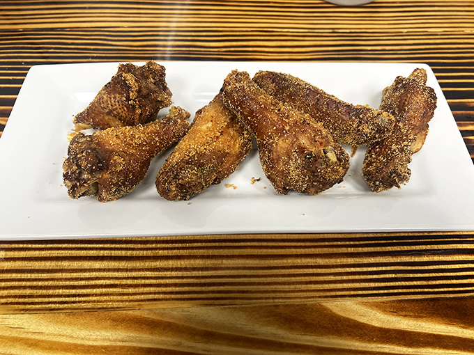 These wings aren't messing around&mdash;seasoned with what appears to be a dry rub that promises flavor without the need to towel off between bites.