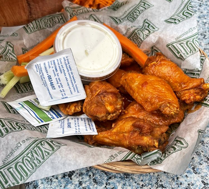 These wings aren't just Buffalo-style, they're a masterclass in crispiness and sauce distribution. The celery and blue cheese aren't sidekicks &ndash; they're essential supporting actors.