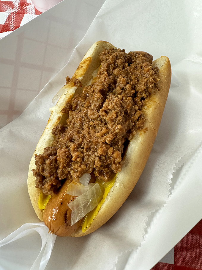 The chili dog—America's most honest food. No pretension, just a soft bun cradling savory chili and a hot dog that means business.