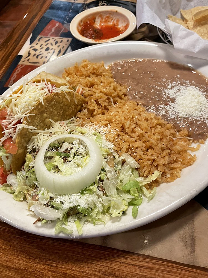 That chimichanga looks like it's wearing a delicious cream sauce tuxedo, ready for its grand entrance at your table.