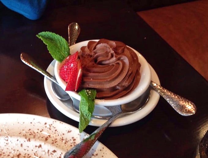 Chocolate mousse that's simultaneously light as air and rich as Midas, garnished with fresh strawberry and mint. Spoons have been known to fight over the last bite.