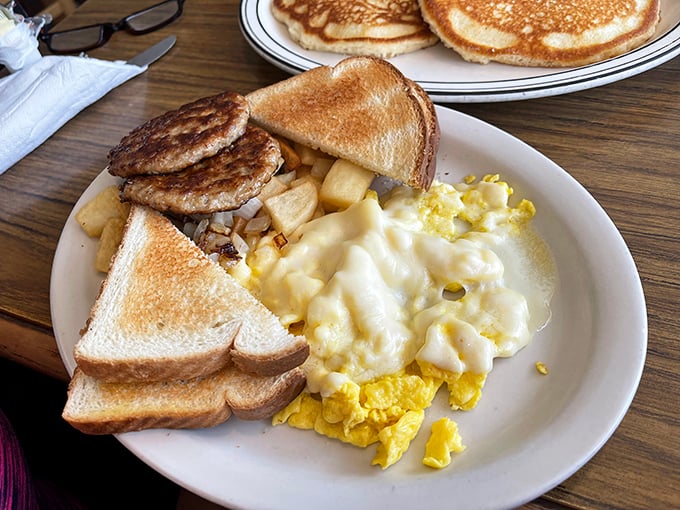 Breakfast perfection on a plate. The toast achieves that mythical golden-brown state that home toasters have been failing to replicate for decades.