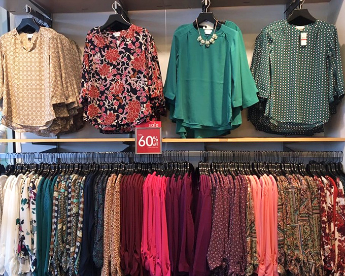 A rainbow of blouses at 60% off&mdash;where fashion dreams and budget realities find their happy compromise.