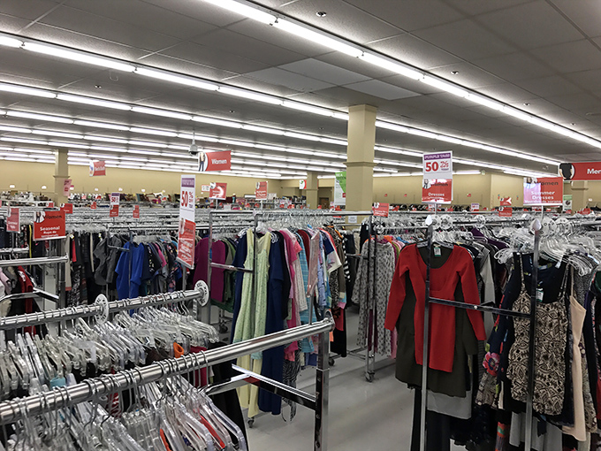 Color-coded clothing creates a rainbow road of fashion possibilities, each garment holding the promise of reinvention.