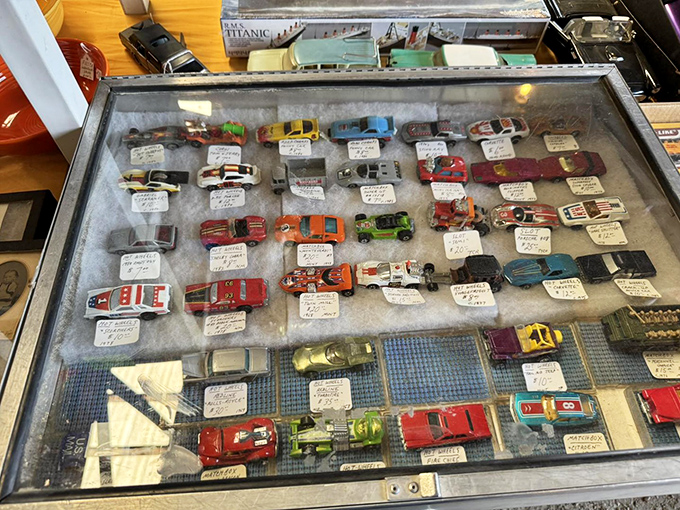 Miniature automotive history under glass&mdash;each tiny car representing some collector's first ride, dream vehicle, or the one that got away.