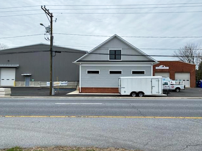 The Appoquinimink River, once Odessa's commercial lifeline, now offers serene views where golden reeds dance against winter's blue waters.