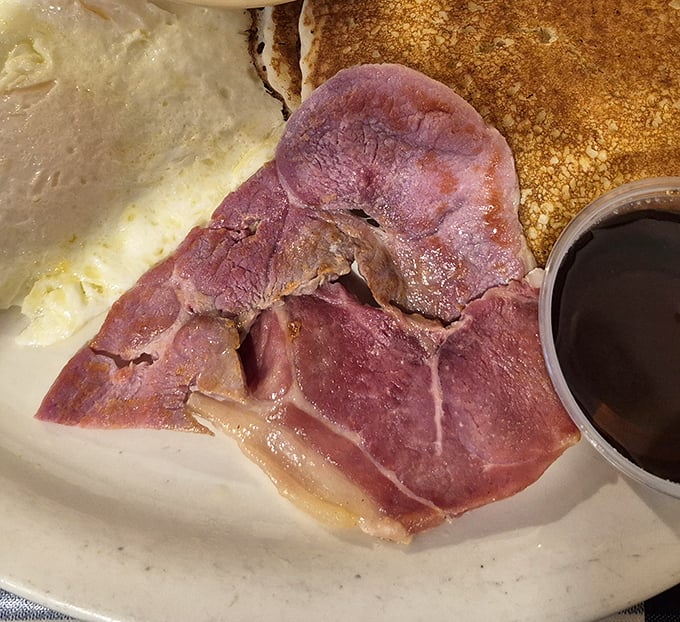 Country ham so perfectly cured it deserves its own meditation practice. Pair with red-eye gravy for a religious experience.