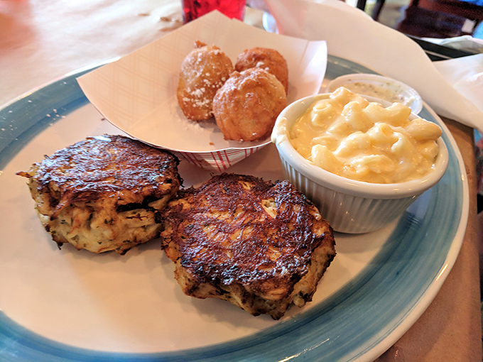 These crab cakes aren't just browned&mdash;they're suntanned to perfection. Minimal filler, maximum flavor, and those hush puppies are the backup singers stealing the show.