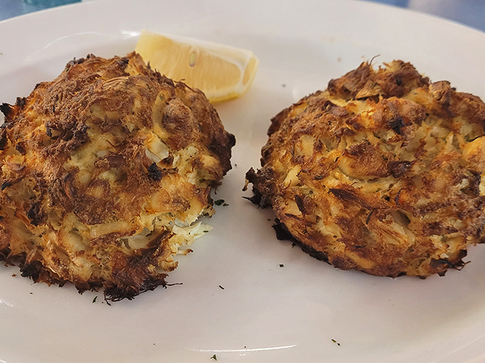 Maryland's finest crab cakes transform humble crustaceans into golden orbs of coastal perfection that defy all expectations.