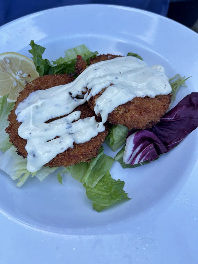 Crab cakes that actually taste like crab&mdash;what a concept!&mdash;crowned with house-made sauce that complements rather than overwhelms.