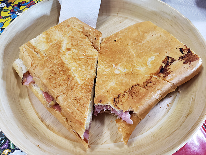 The Cuban sandwich&mdash;Tampa's culinary handshake&mdash;pressed to golden perfection with layers that tell the city's immigrant story one bite at a time.
