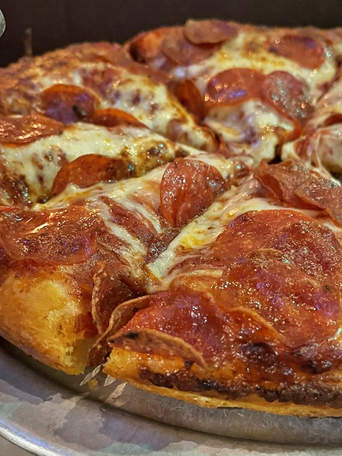 Pepperoni that curls into perfect little flavor cups, creating those crispy-edged pools of savory magic that pizza dreams are made of.