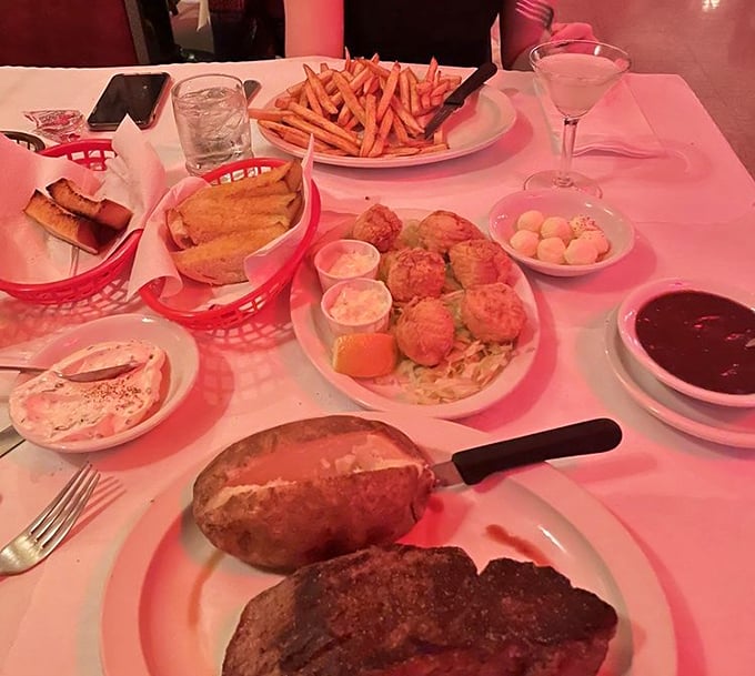 Feast mode activated: prawns, scallops, fries and steak create the kind of spread dreams are made of.