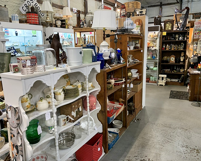 White shelves laden with yesterday's dinnerware, ready for tomorrow's dinner parties. Grandma would approve of your excellent taste.