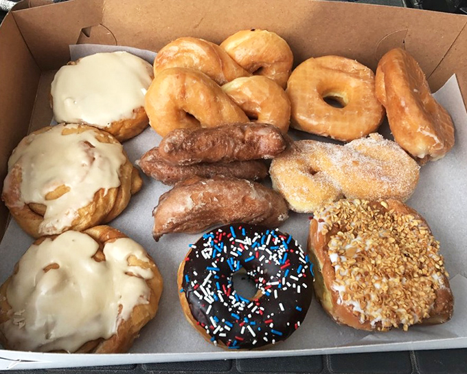 The donut box&mdash;a treasure chest containing more joy than should legally fit in cardboard. Diet plans enter at their own risk.