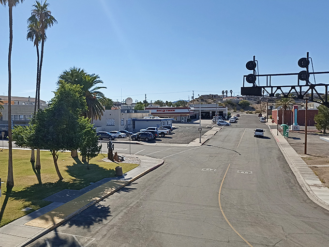 Downtown Needles embraces that classic small-town vibe where palm trees stand sentinel over quiet streets. Rush hour here means three cars at a stop sign.
