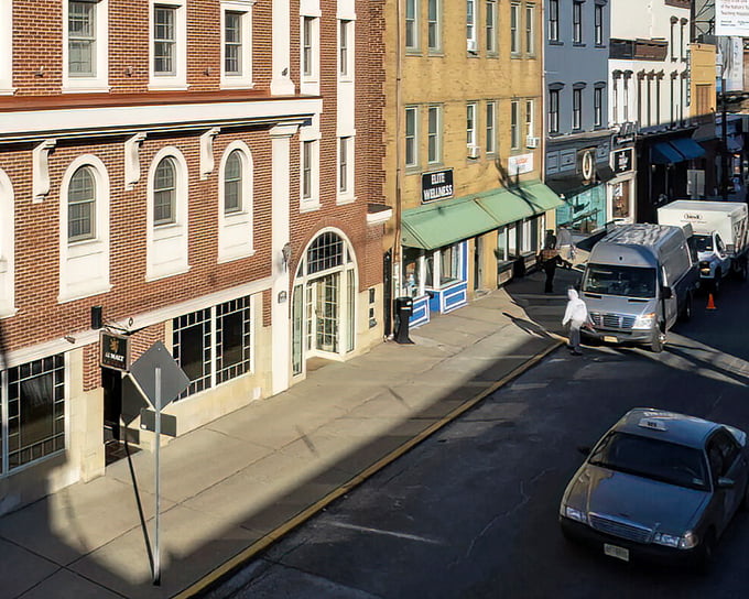 Historic architecture meets modern commerce on these brick-lined streets, where century-old buildings house businesses that keep Red Bank vibrant and relevant.