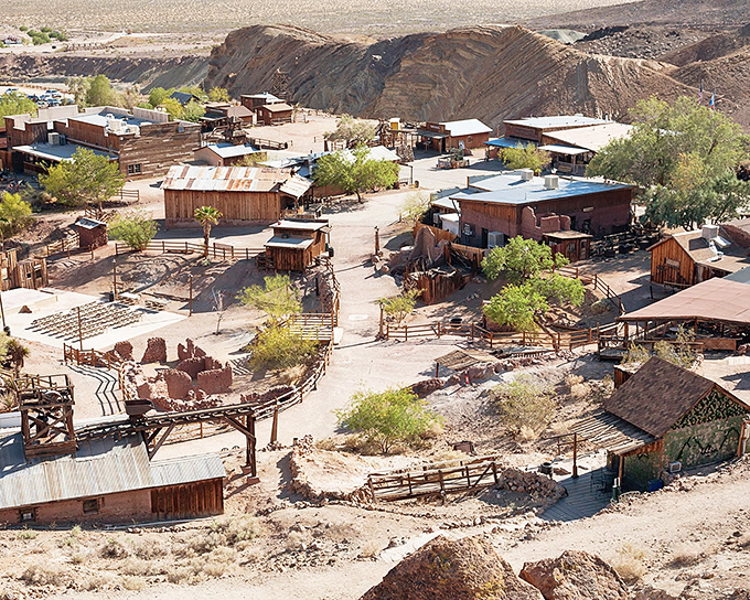 The town sprawls across the hillside like a historical diorama come to life. From this vantage point, you can almost hear the phantom pickaxes.