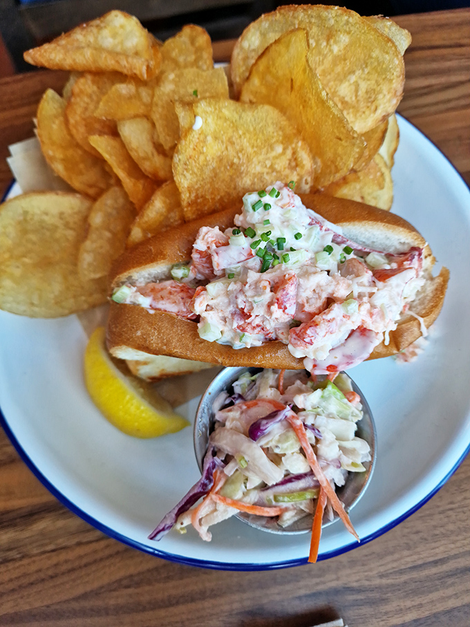 The lobster roll&mdash;that perfect New England export&mdash;arrives overflowing with sweet meat, alongside house-made chips that deserve their own fan club.
