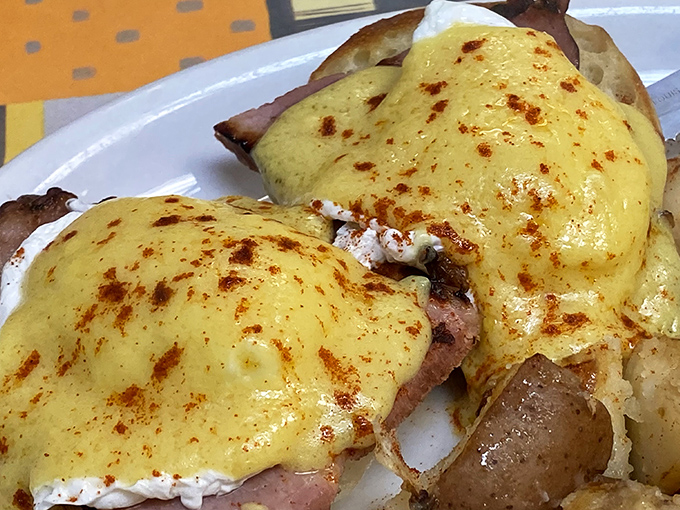 Eggs Benedict with a hollandaise so rich it could buy a yacht, dusted with paprika for that extra touch of love.