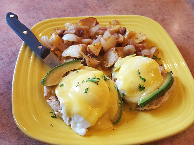 Eggs Benedict with a twist&mdash;cucumber adds freshness to this breakfast classic. The bright yellow plate is practically radiating happiness, much like your taste buds will be.