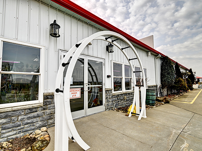 The entrance arch beckons like a portal to bargain dimension. Step through these doors and kiss your shopping budget guilt goodbye.