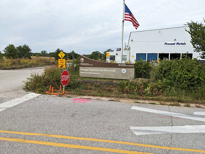 Even the entrance sign knows it's guarding something special &ndash; standing sentinel between the everyday world and your lakeside escape.