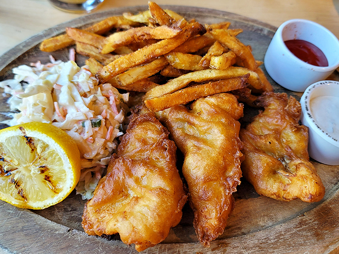 Fish and chips that would make a Londoner homesick. The golden batter shatters like glass, revealing steamy, flaky cod that's worth crossing the Atlantic for.