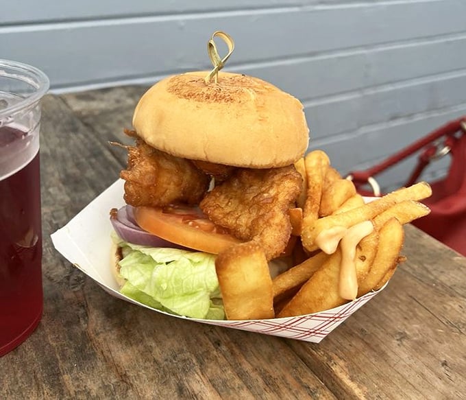 The fish sandwich that makes you question why you've wasted time on lesser versions. Architecture of deliciousness with crisp lettuce as the foundation.