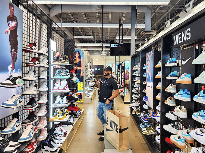 Sneaker paradise achieved - rows of athletic footwear that make marathon shopping sessions suddenly seem absolutely worth it.