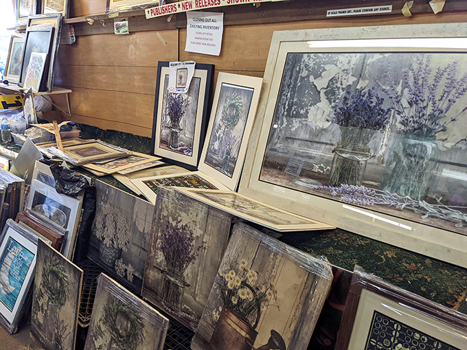 Lavender dreams and artistic scenes line this vendor's stall. Like walking into a gallery where you can actually afford the art!