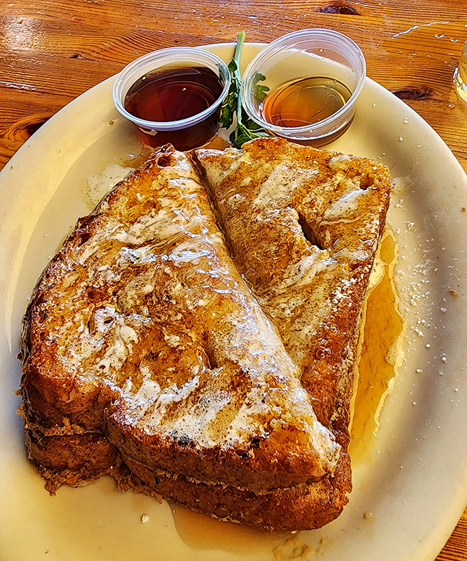 French toast thick as a novel and twice as satisfying, with syrup pools deep enough for diving.