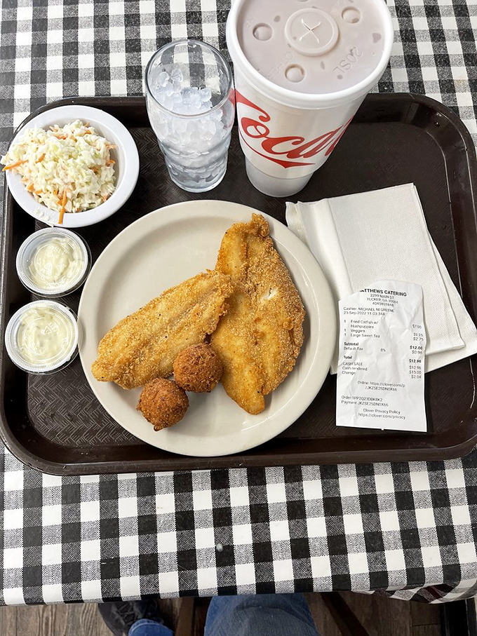 Fried catfish and coleslaw on a cafeteria tray&mdash;the kind of honest meal that makes fast food chains weep with inadequacy.