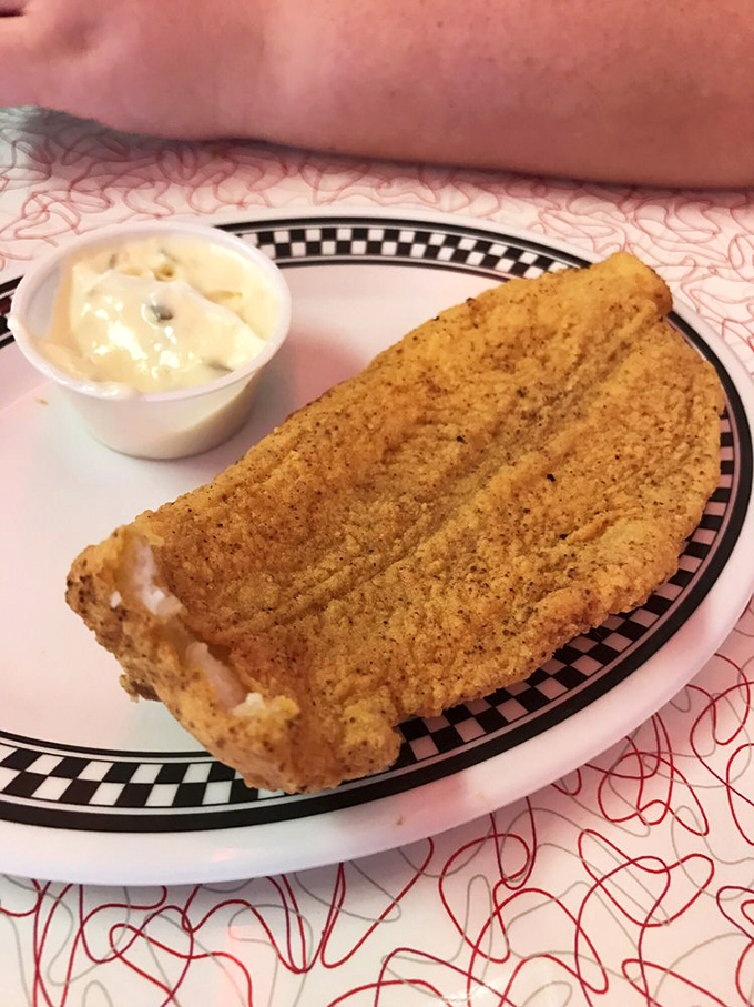 This cornmeal-crusted catfish isn't just fried&mdash;it's transformed into a golden-brown masterpiece that would make Southern grandmothers nod in solemn approval.