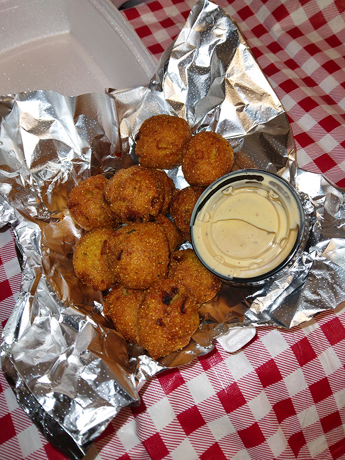 These golden-fried mushrooms aren't just appetizers&mdash;they're little umami bombs waiting to explode with earthy goodness. The dipping sauce is merely a bonus.