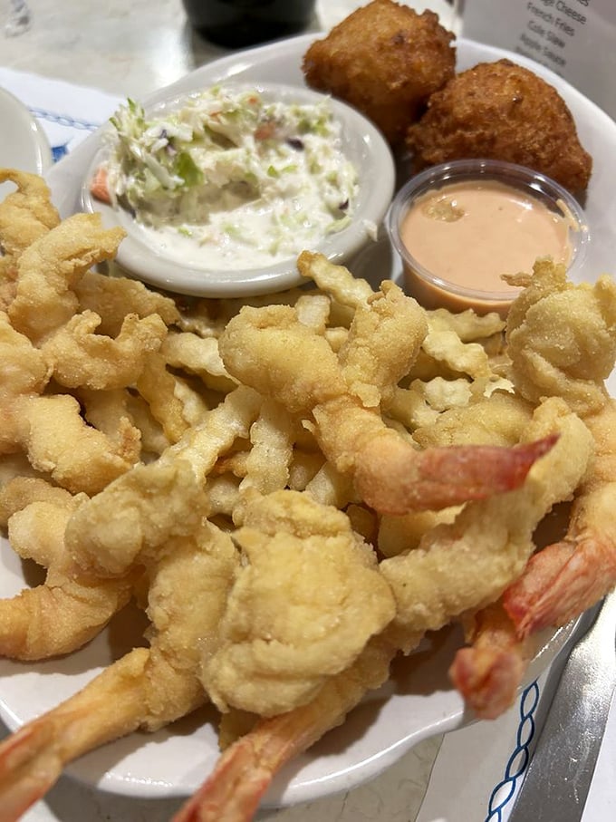 Golden-fried shrimp that snap between your teeth, served with creamy coleslaw and hush puppies that would make any Southerner proud.