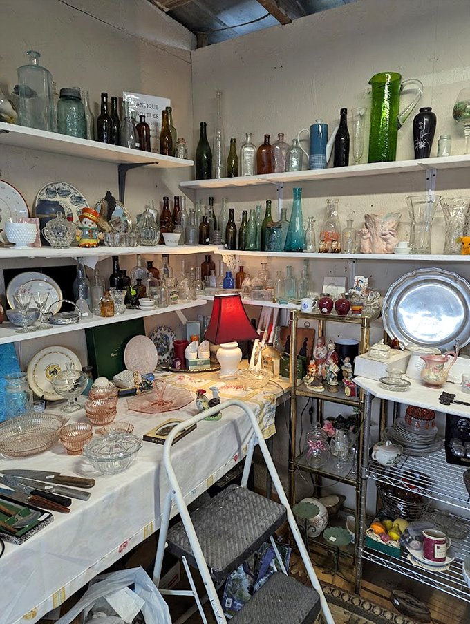 A collector's paradise of vintage glassware and Depression glass. Each shelf tells a different story of American dining tables past.