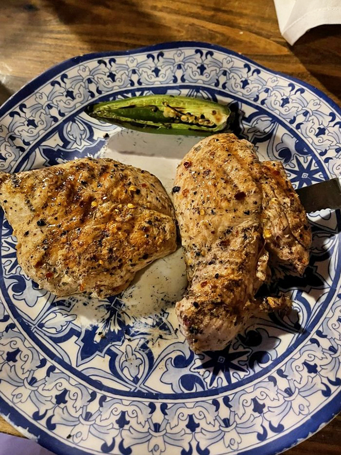 Even chicken gets the royal treatment here. Those char marks aren't accidents &ndash; they're flavor signatures from masters of the flame.