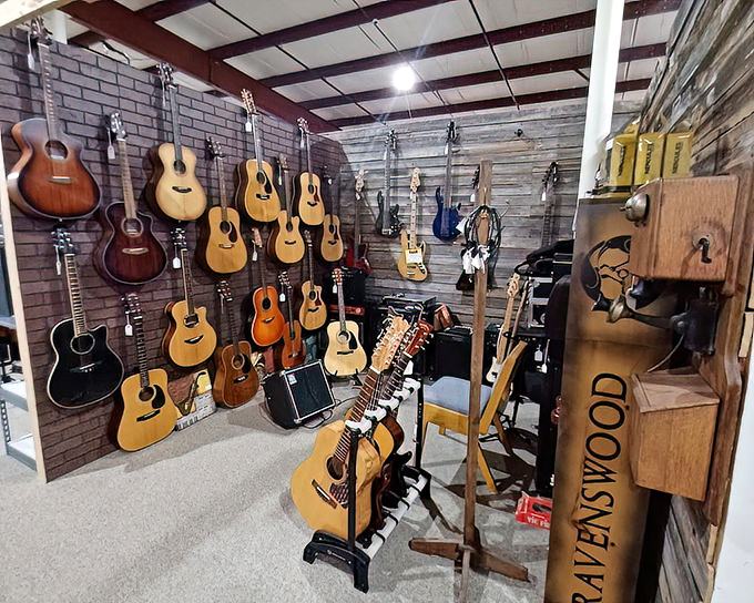 Guitar heaven for musicians and collectors alike. These wooden beauties hang like ripe fruit, each with stories of campfires, heartbreaks, and honky-tonks.
