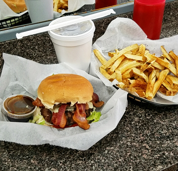 The bacon cheeseburger that makes you question your loyalty to cheesesteaks. That crispy bacon is making a compelling argument.