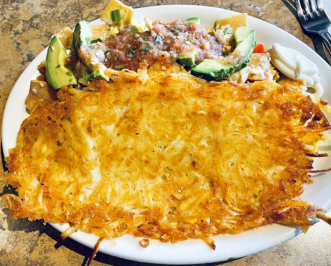 These hash browns achieve the impossible physics of being simultaneously crispy-edged and tender-centered&mdash;a potato paradox worth solving.