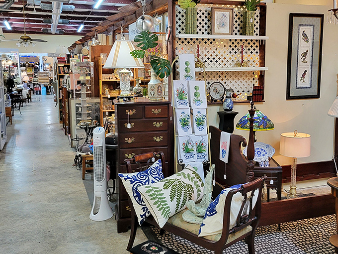 Nature meets nostalgia in this perfectly curated corner. That botanical pillow would have Martha Stewart herself reaching for her wallet.