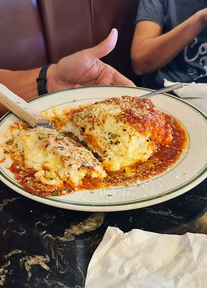 Someone's Italian grandmother would approve of this lasagna&mdash;layers of cheese stretching skyward with each forkful like a delicious magic trick.